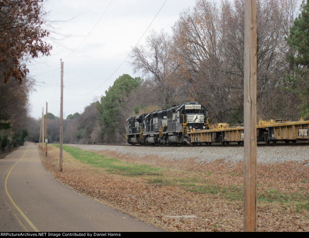 3 types of EMD's pull a pig train towards Memphis